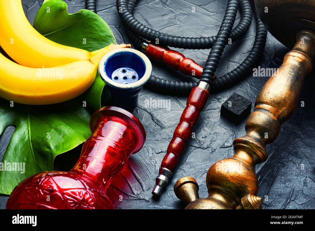 Smoking Turkish hookah with banana flavored shisha tobacco Stock Photo ...