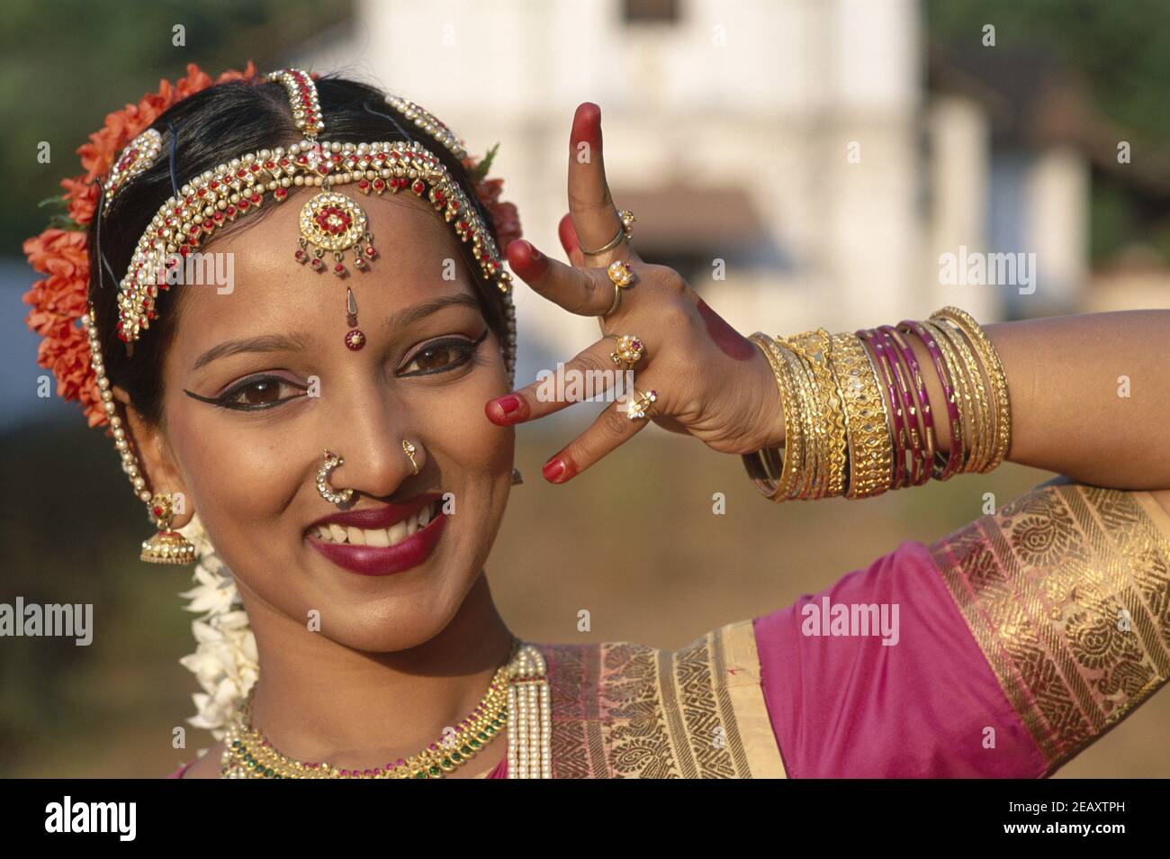 India,Goa, portrait of a pretty smiling Female Dancer Dressed in ...