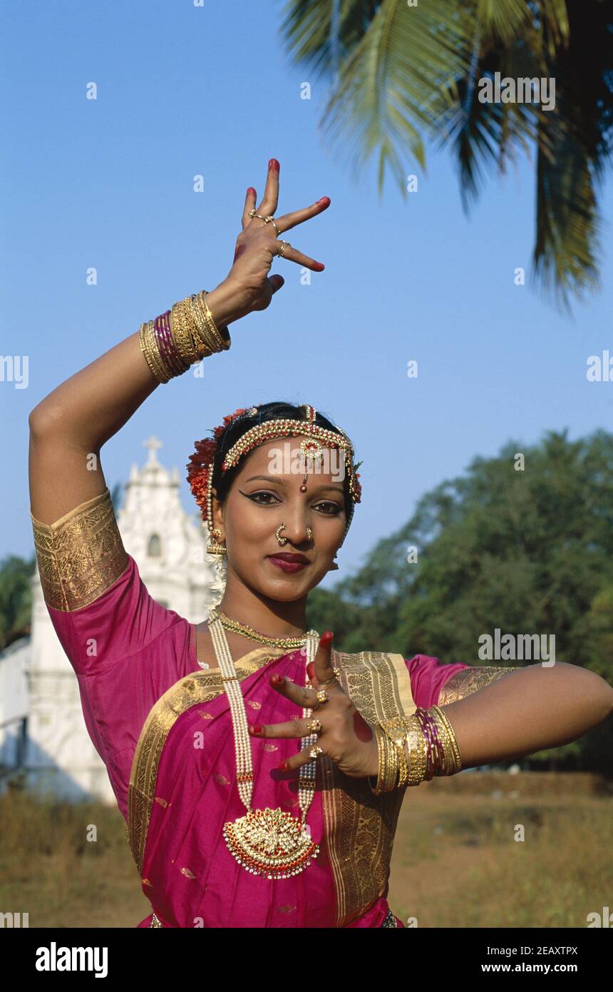 India,Goa, portrait of a pretty smiling Female Dancer Dressed in ...