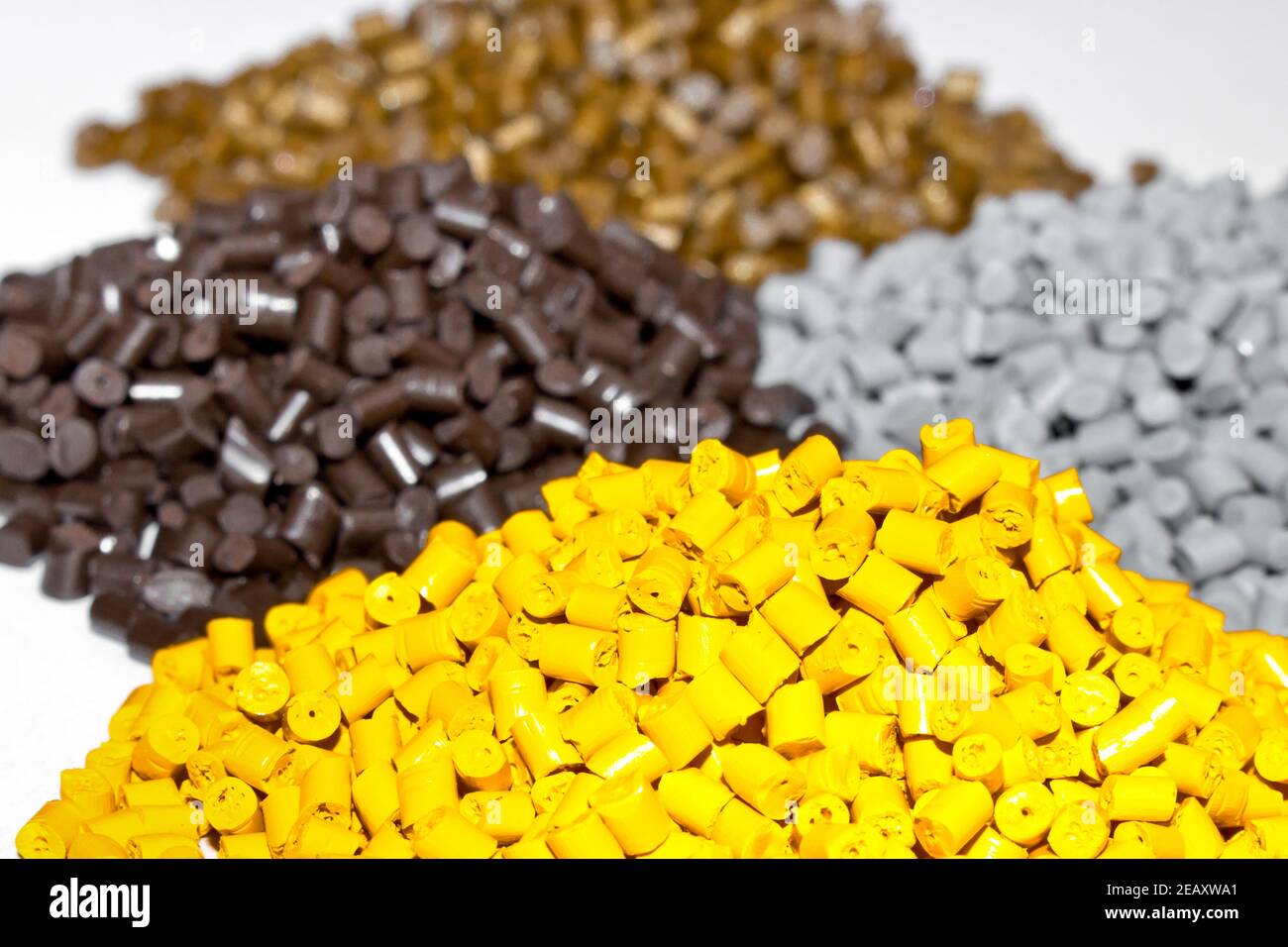 Plastic pellets on the table in the laboratory. Polymeric dye. Colorant ...