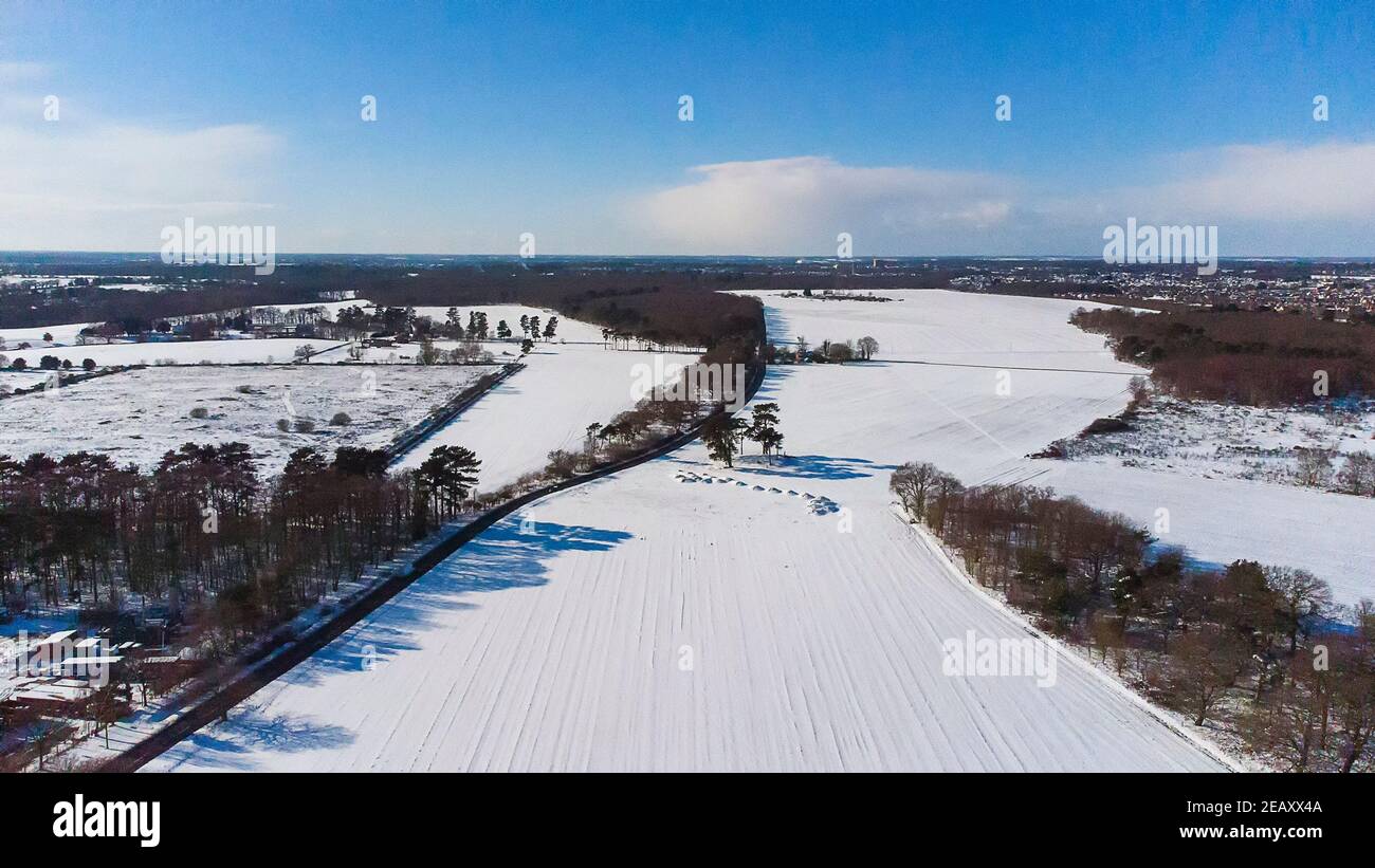 A birds eye view of the snow covered landscape in a rural part of ...