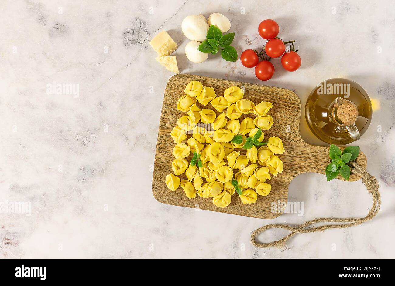 Homemade raw Italian stuffed pasta tortellini Stock Photo - Alamy