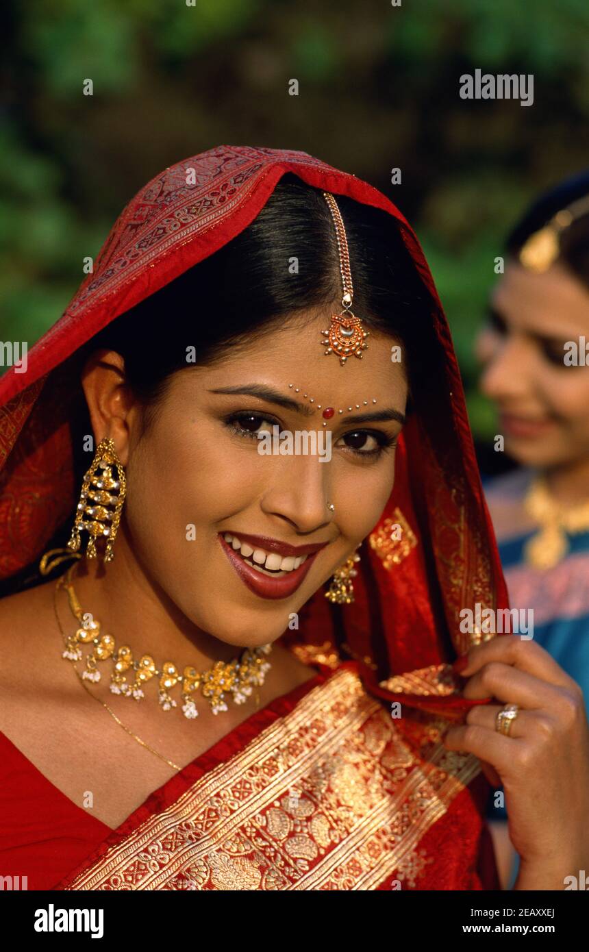 Asia, India, Mumbai, model released portrait of a beautiful smiling ...
