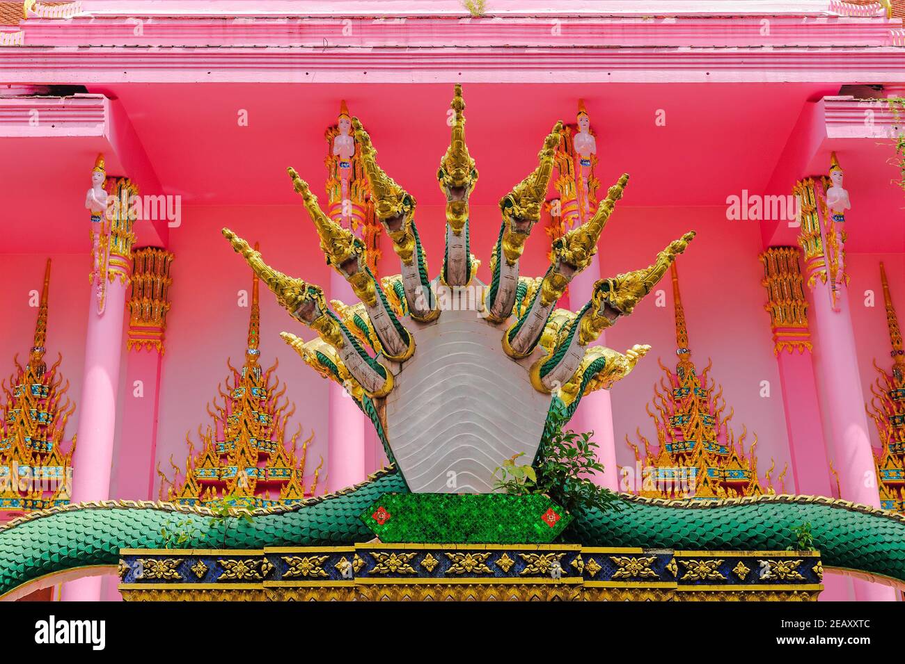 Colorful and intricate details of serpent-like statue is commonly seen ...