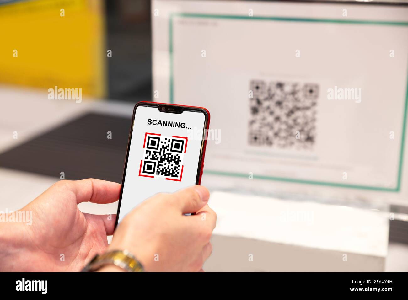 Qr code payment, E wallet , cashless technology concept. Man scanning ...
