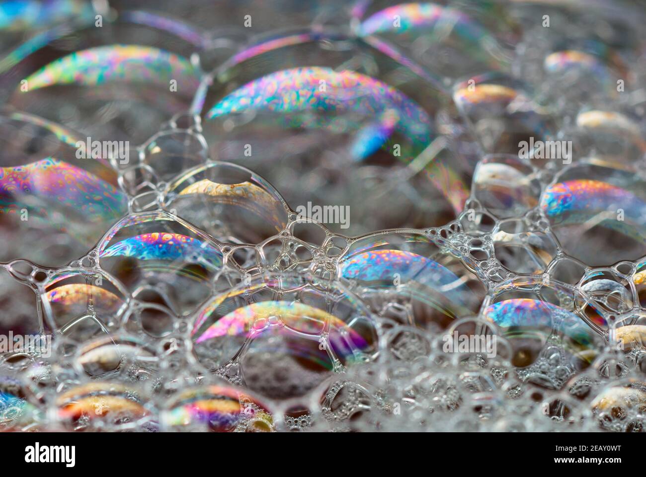 Colorful soap bubbles with diverse patterns, close up. Forming a ...