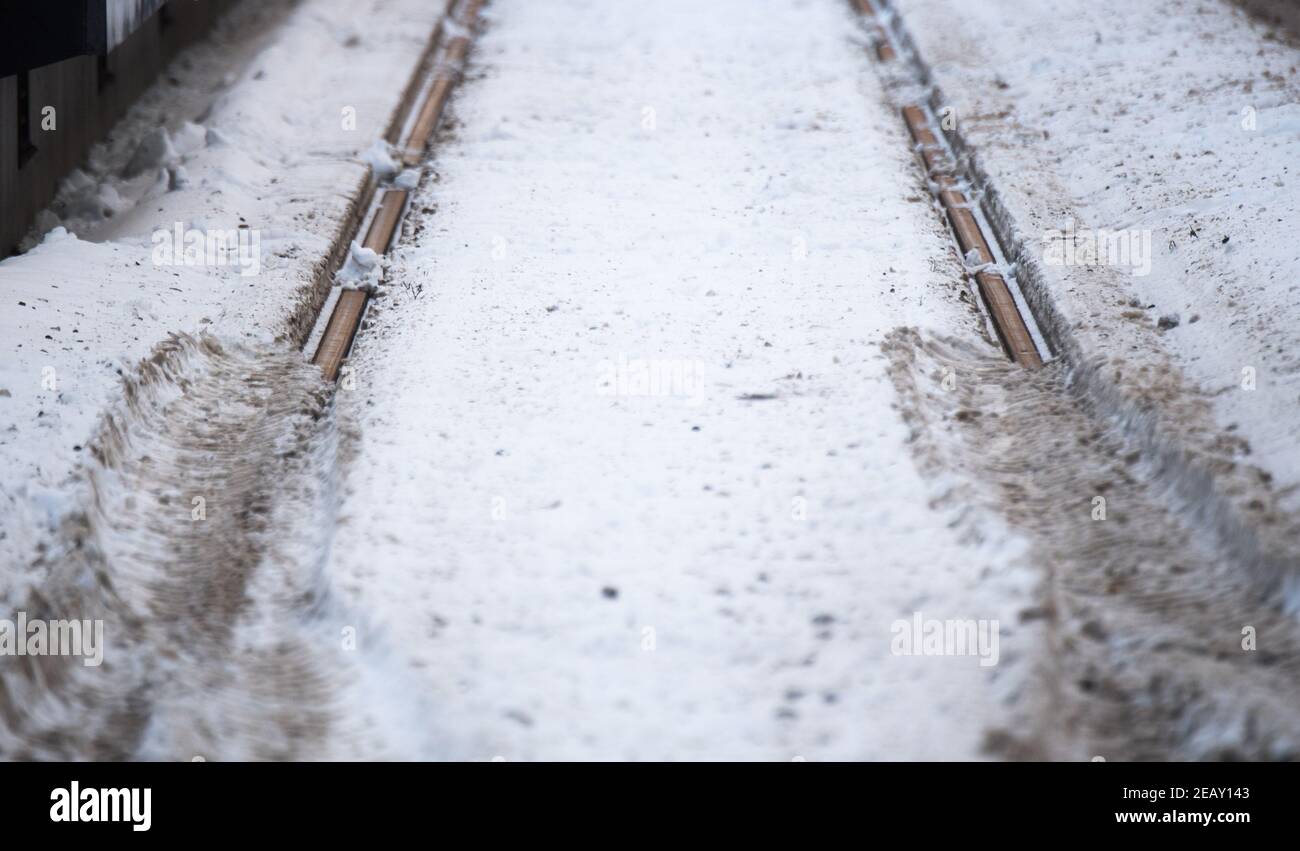 Hanover, Germany. 11th Feb, 2021. Snow and ice lie on the rails of the ...