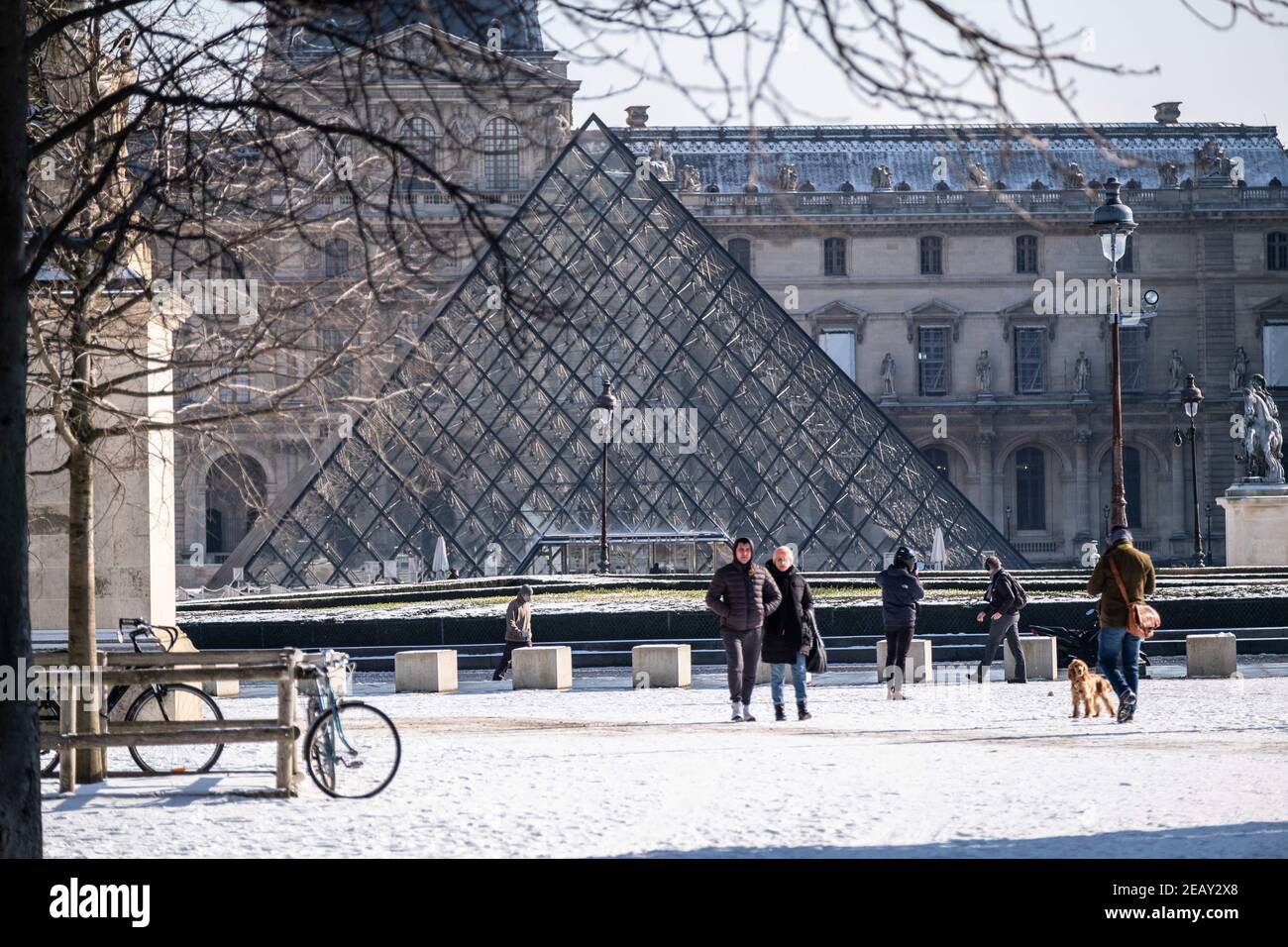 Pyramid of Louvre under snow in Paris, France on February 10, 2021. A ...