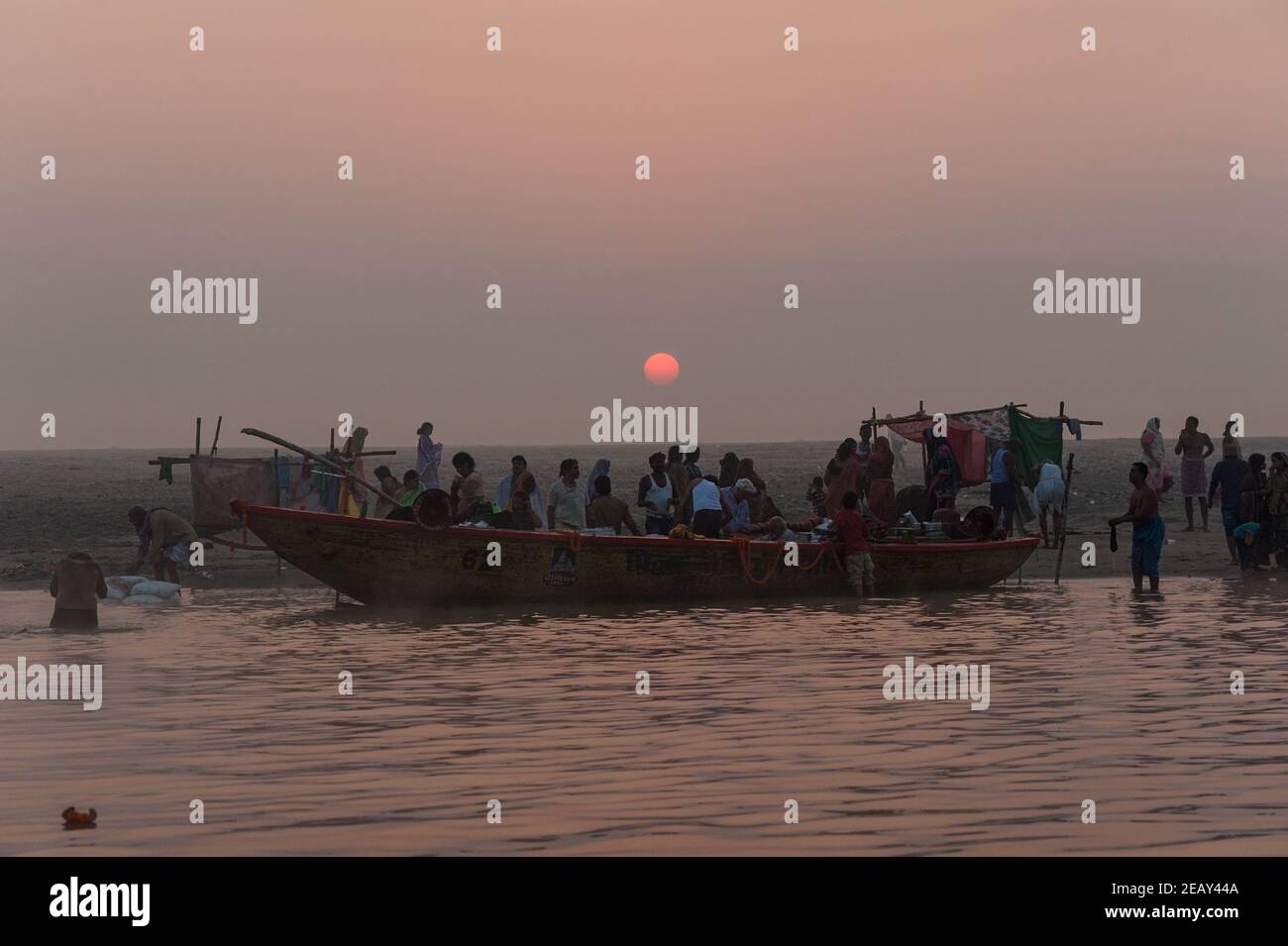 THE MORNING RITUAL AT THE GANGES, VARANASI – INDIA. SUNRISE AT THE HOLY ...