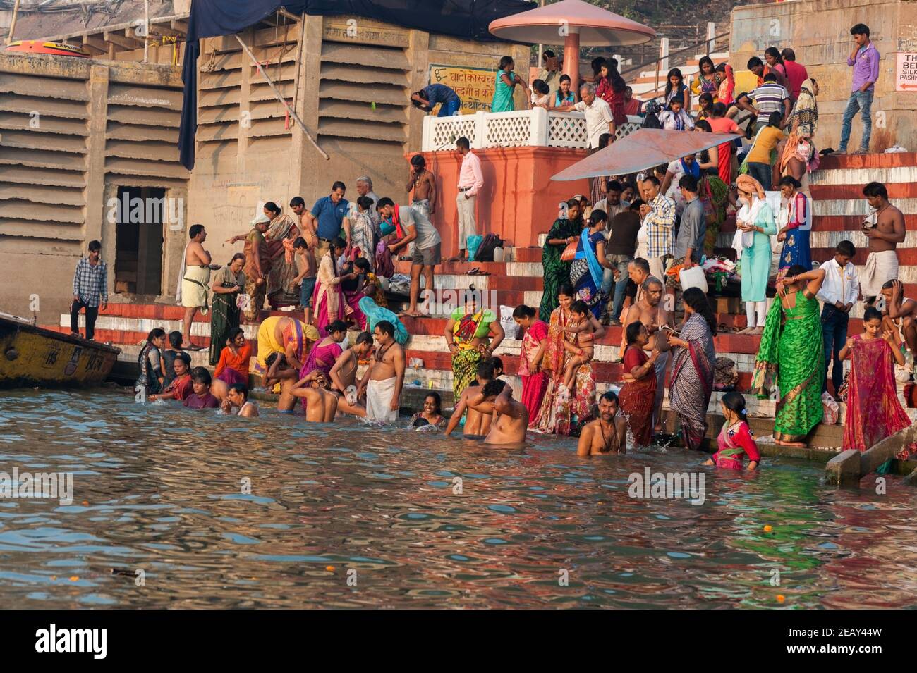THE MORNING RITUAL AT THE GANGES, VARANASI – INDIA. SUNRISE AT THE HOLY ...