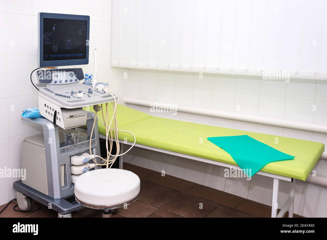 Modern medical equipment in clinic. Interior of examination room with ...