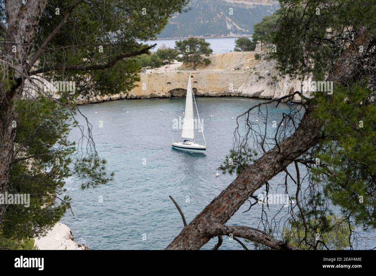 Sailing boat between the cliffs. - In the hollows between the cliffs, a ...