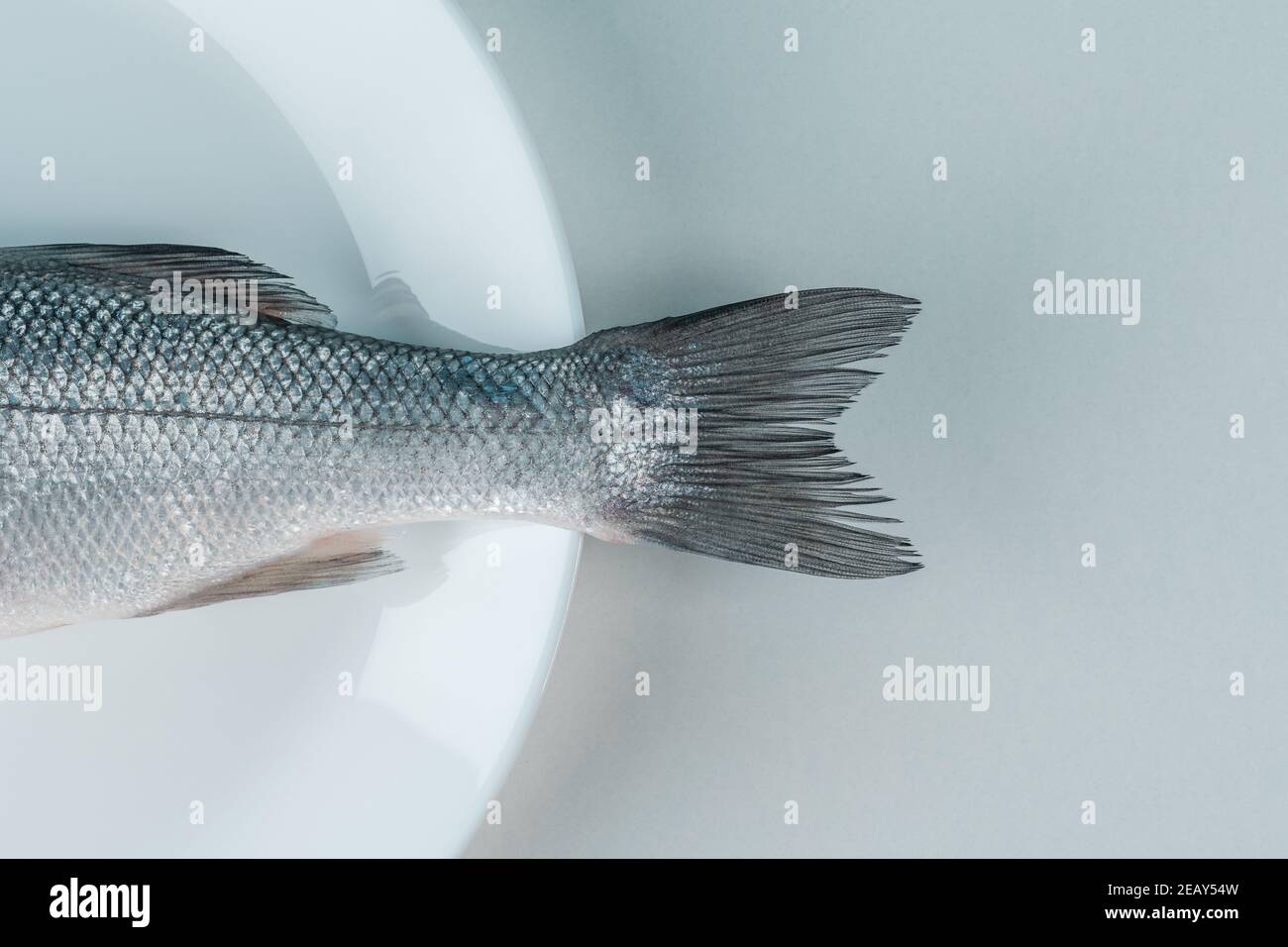 Colorful fish dish on white plate hi-res stock photography and images ...