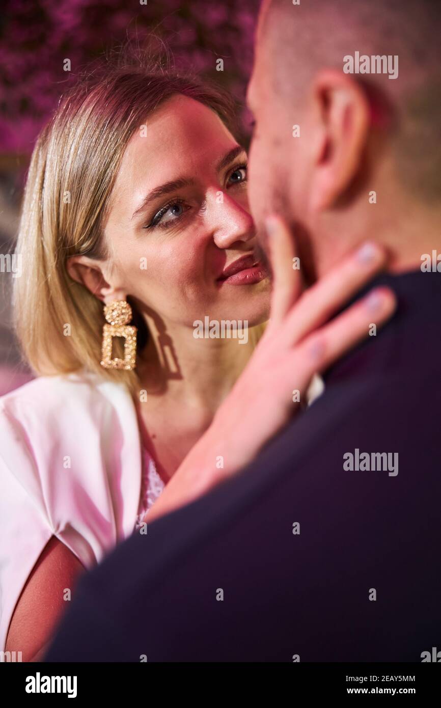 Beautiful lady in love gazing at her beau Stock Photo - Alamy