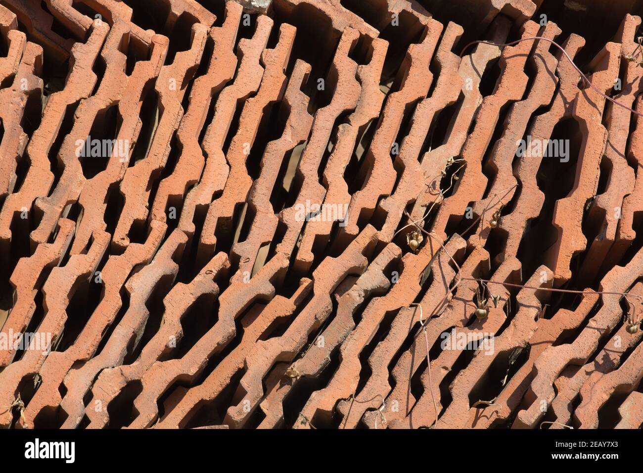 Stacked terracotta roof tiles Stock Photo - Alamy