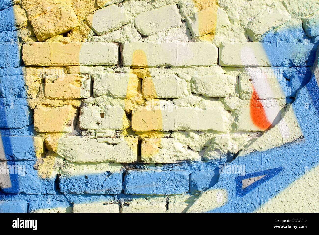 Brick wall with graffiti Stock Photo - Alamy