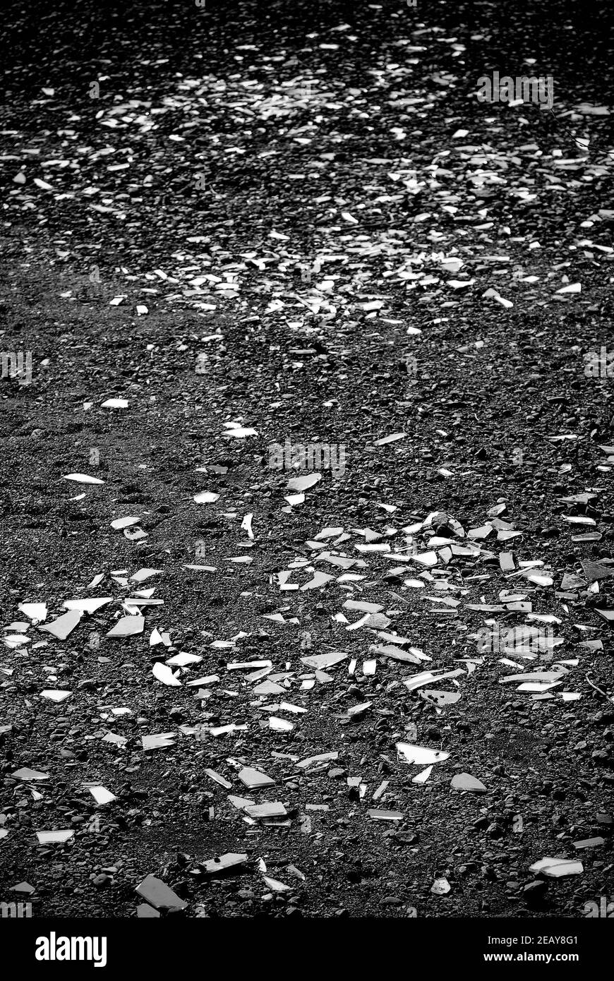 Broken glass pieces fragments Black and White Stock Photos & Images - Alamy
