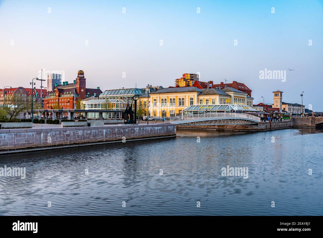 MALMO, SWEDEN, APRIL 24, 2019: Sunset view of waterfront alongside a ...