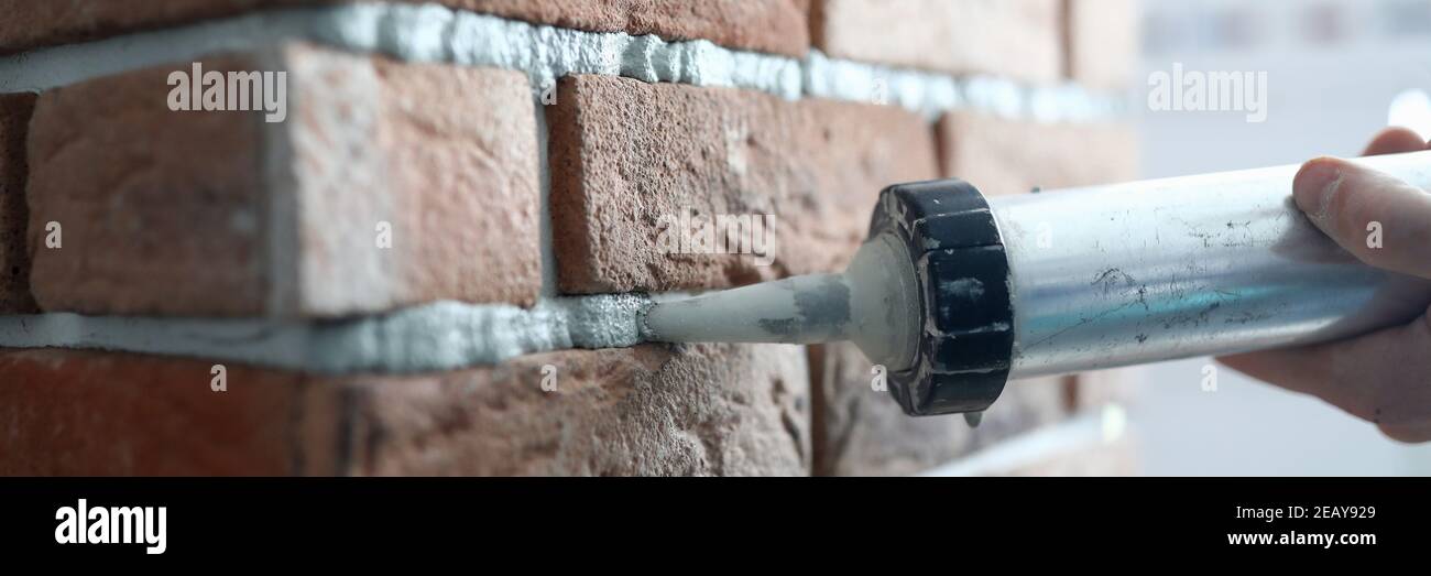 Grouting with tiling fugue Stock Photo - Alamy