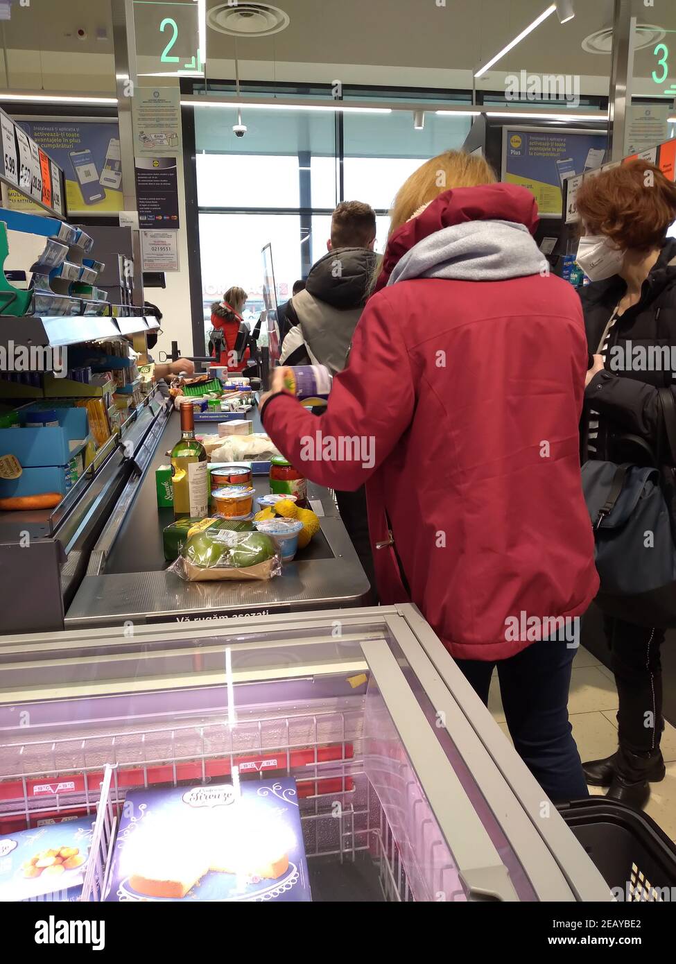 Conveyor belt at the checkout point in a supermarket. Bucharest ...