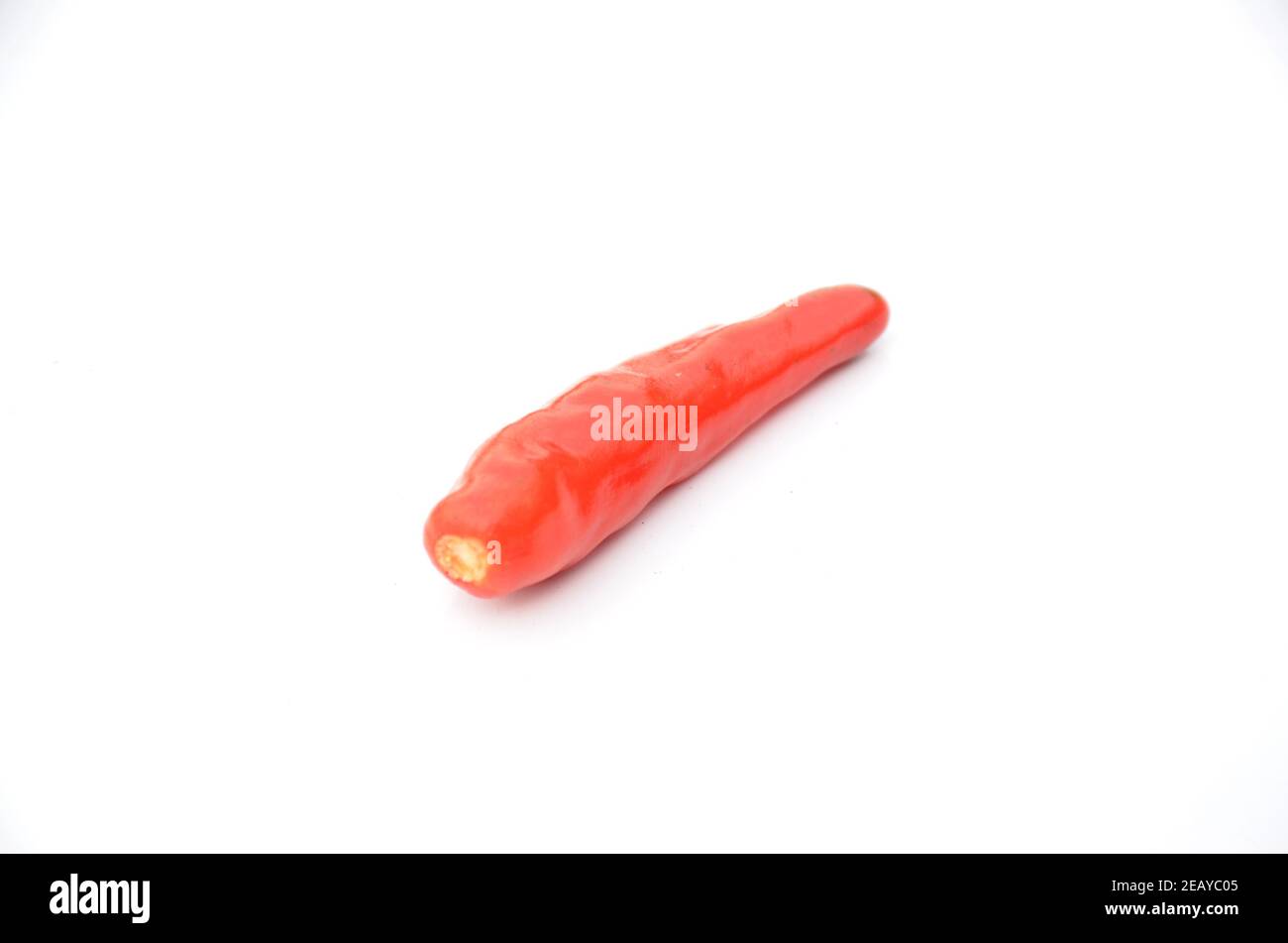 Closeup shot of the red ripe chilly isolated on awhite background Stock ...