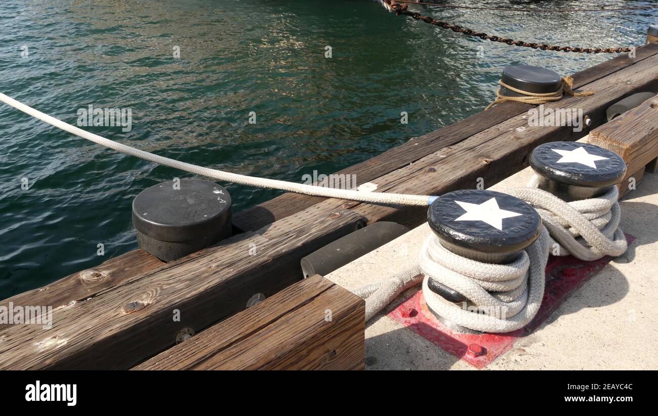 Tied rope knot on metallic bollard with stars, seafaring port of San ...