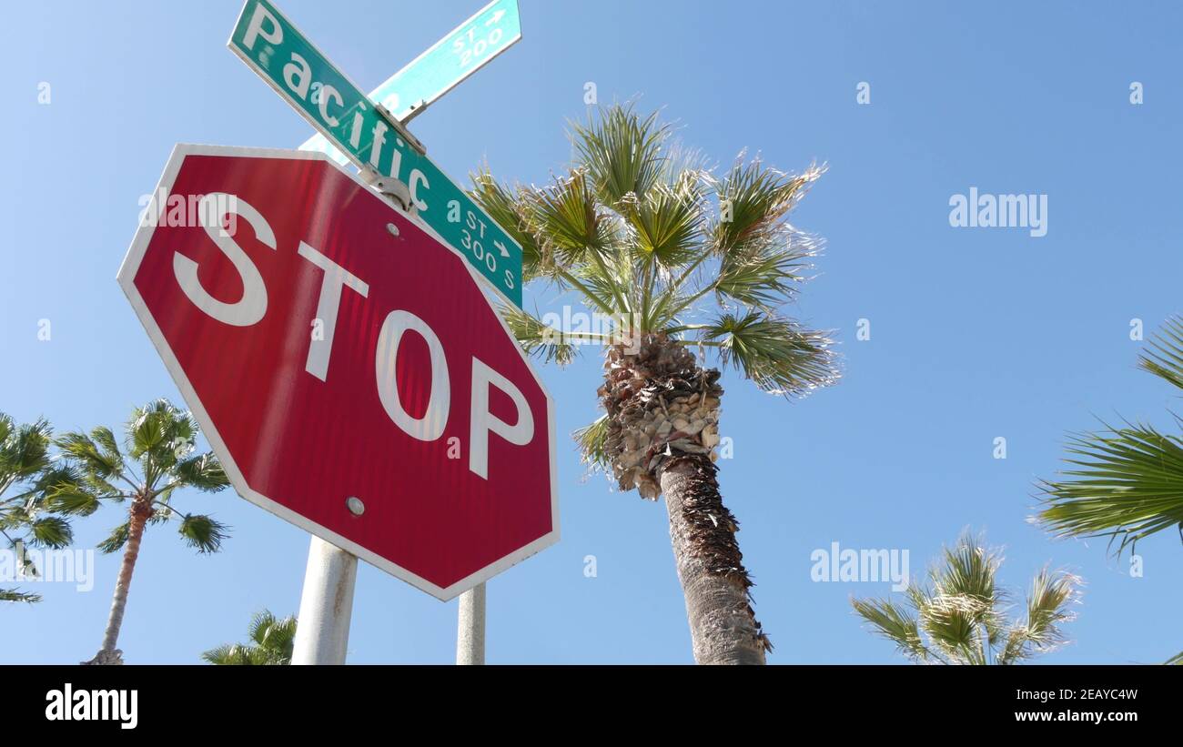 Pacific street road sign on crossroad, route 101 tourist destination ...