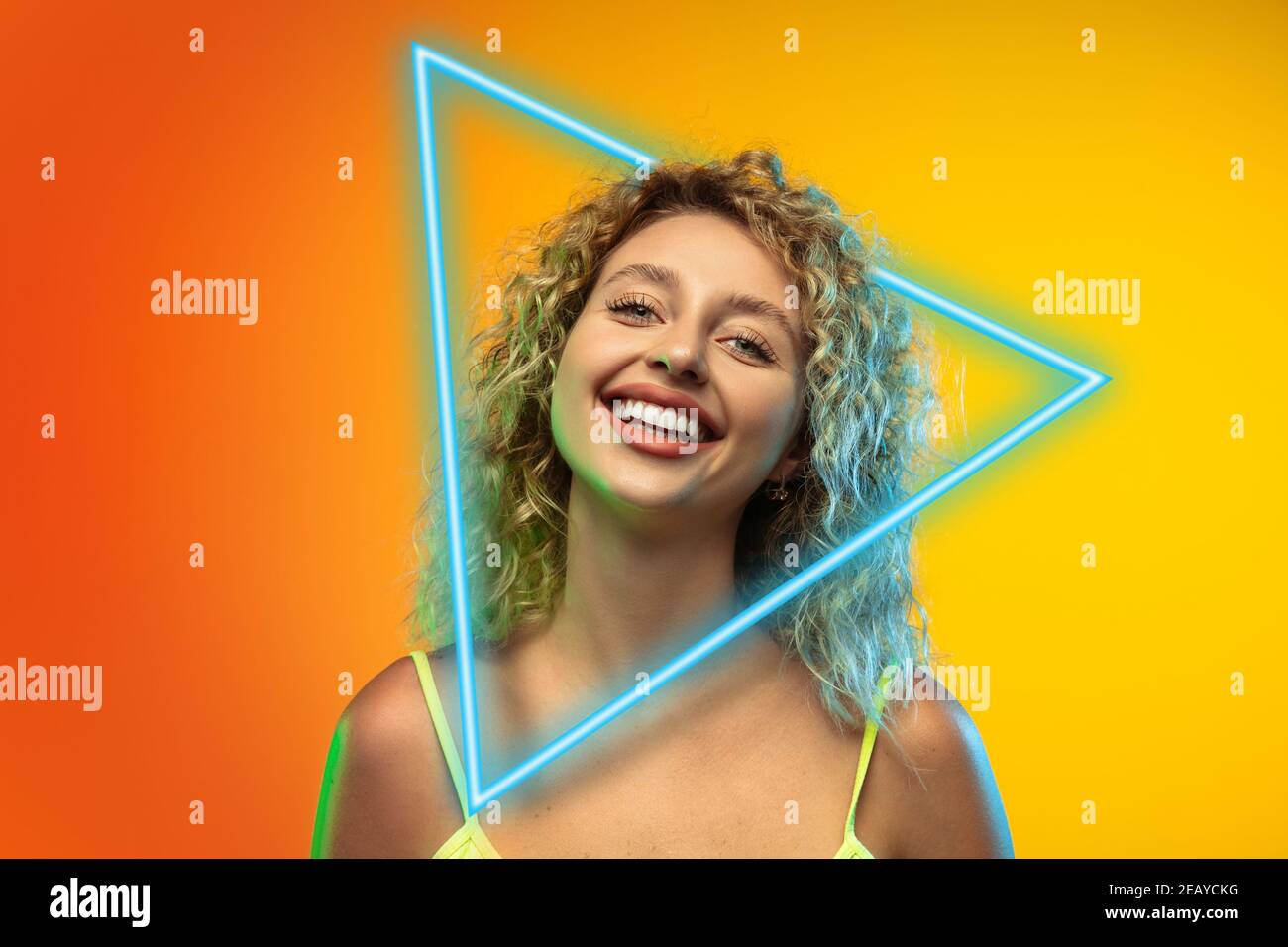 Caucasian young, attractive woman's portrait isolated on gradient ...