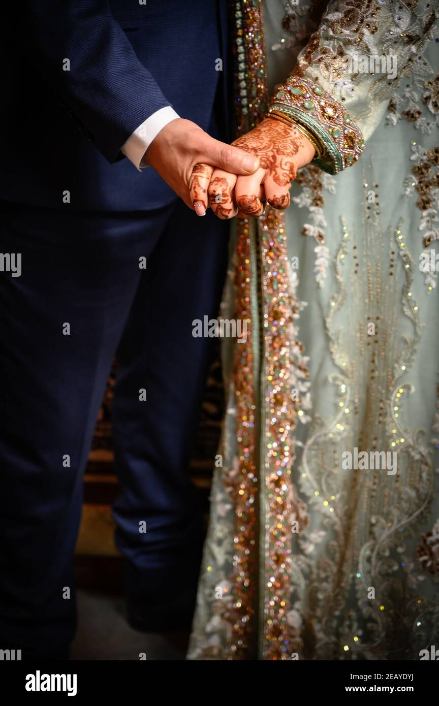 Pakistani Wedding Couple Holding Hands