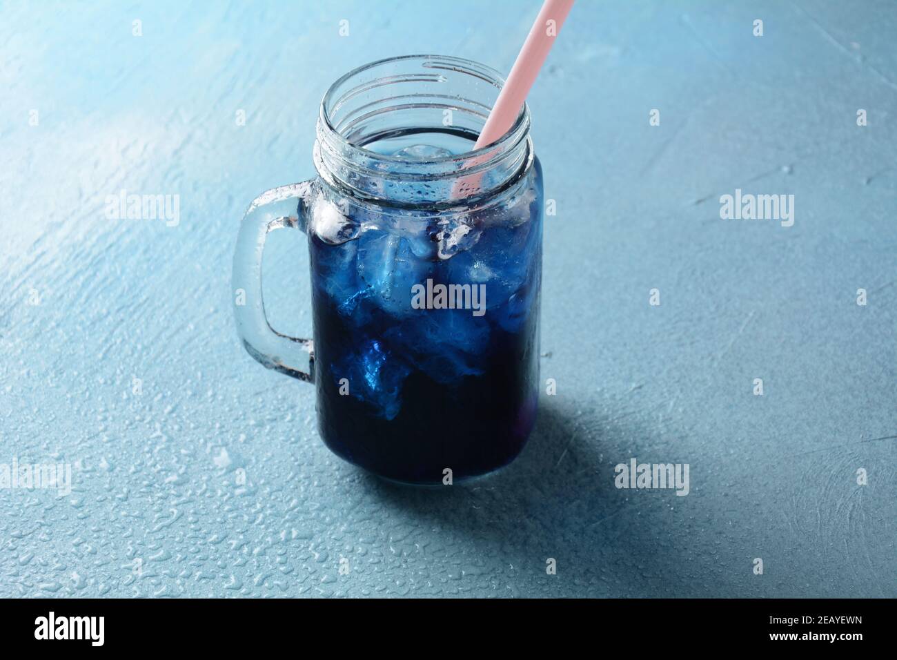 Iced butterfly pea latte. Healthy summer cold beverage, iced organic ...