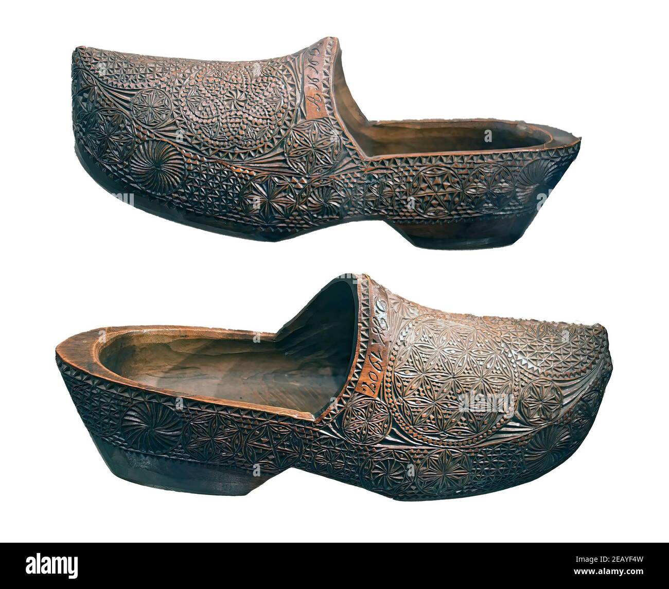 Pair of Dutch clogs or wooden shoes isolated in the white background ...