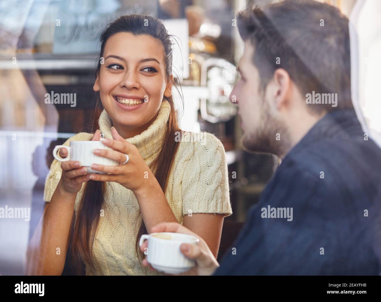 Couple coffee shop winter hi-res stock photography and images - Alamy