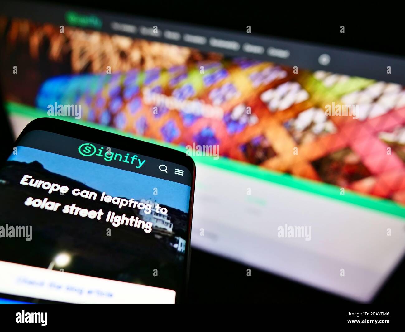 Smartphone with website of Dutch lighting equipment company Signify N.V ...