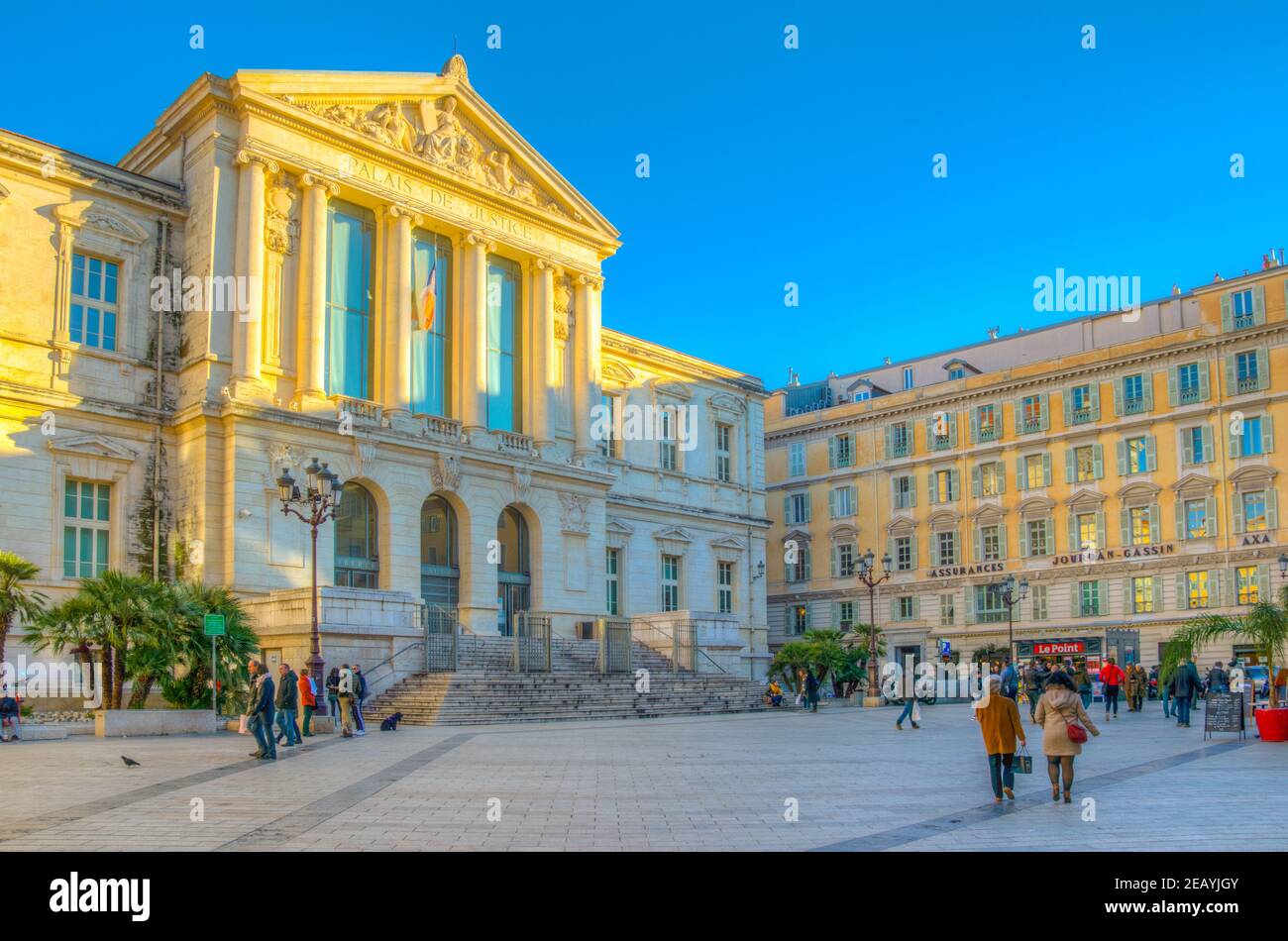 NICE, FRANCE, DECEMBER 28, 2017: People are strolling in front of the ...