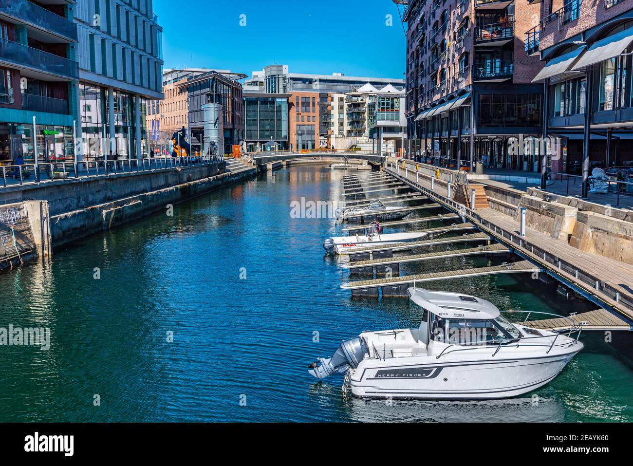 OSLO, NORWAY, APRIL 15, 2019: Motor boats mooring in a channel between ...
