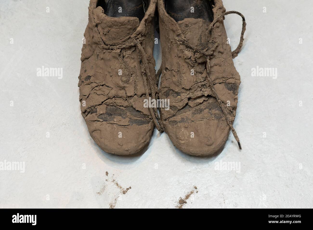Mud covered shoes hi-res stock photography and images - Alamy
