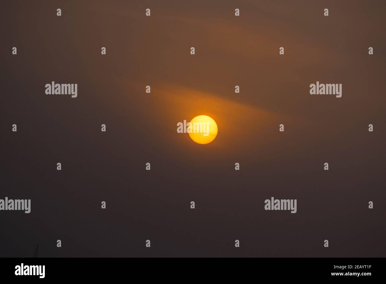 Mesmerizing scenery of sun at sunset Stock Photo - Alamy