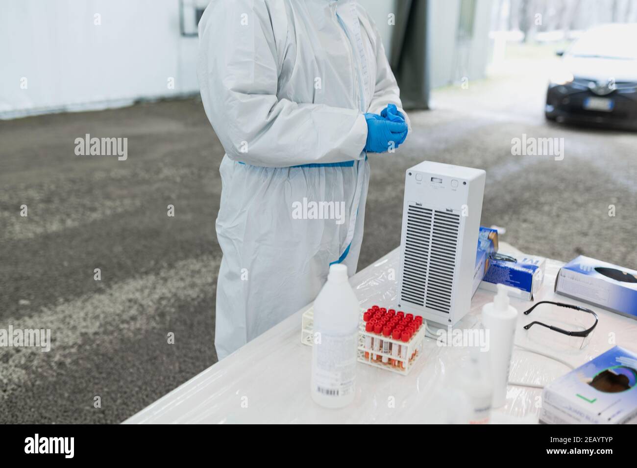 Cropped nurse man with personal protective equipments and suit ...