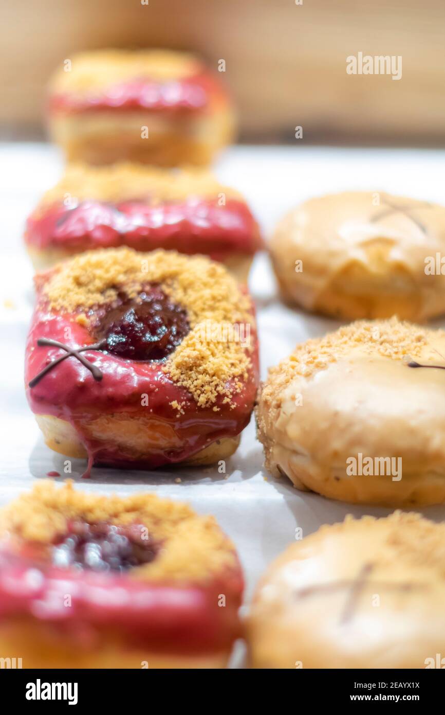 Colorful donuts on a tray, sweet tooth treat for a donut day, various ...