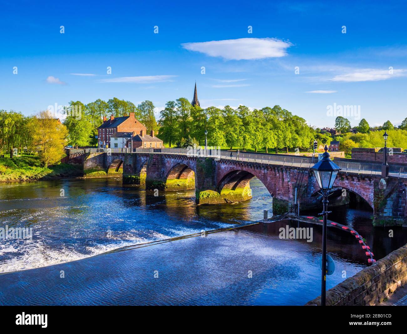 The Grosvenor bridge over the river Dee in Chester with St Mary's Outside the Walls in the ...
