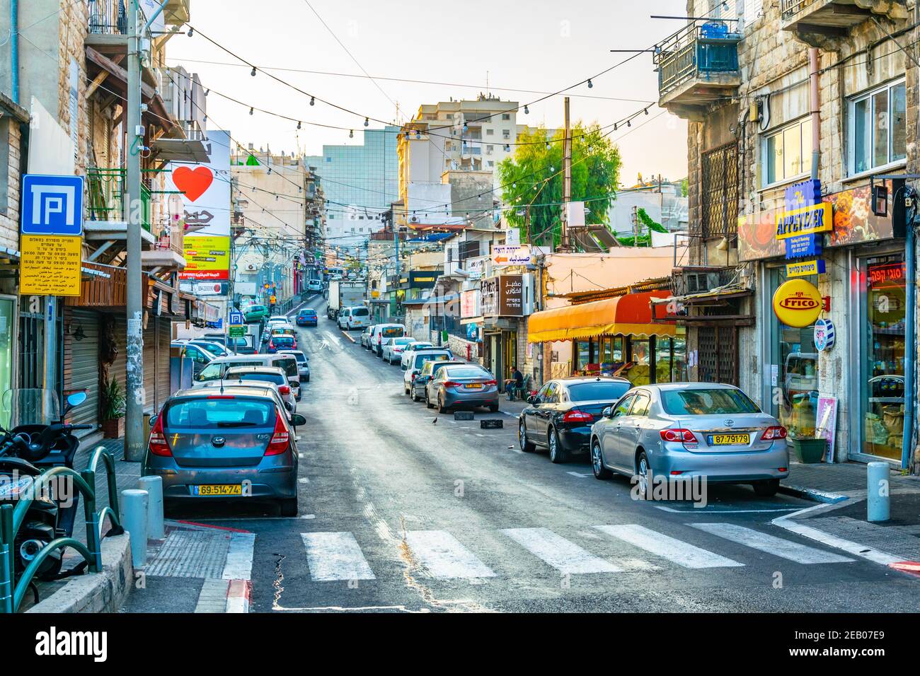 HAIFA, ISRAEL, SEPTEMBER 12, 2018: View of a narrow street in the ...