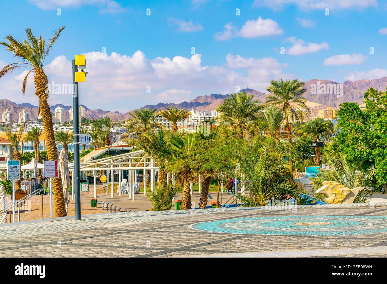 EILAT, ISRAEL, DECEMBER 30, 2018: People are strolling on seaside ...