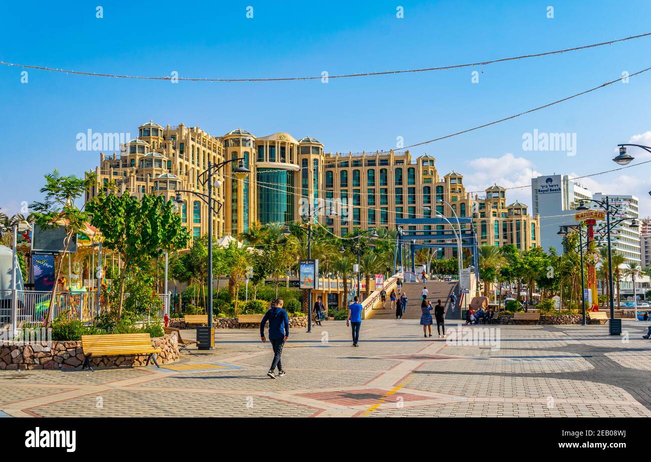 EILAT, ISRAEL, DECEMBER 30, 2018: People are strolling on seaside ...