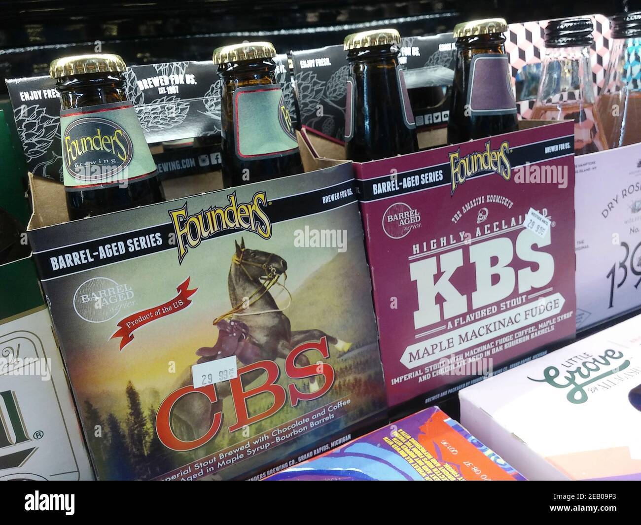 Six-packs of Founders brand flavored beer is seen amongst other beers ...
