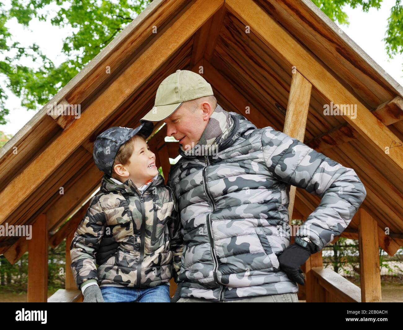 Father and son look at each other hi-res stock photography and images ...