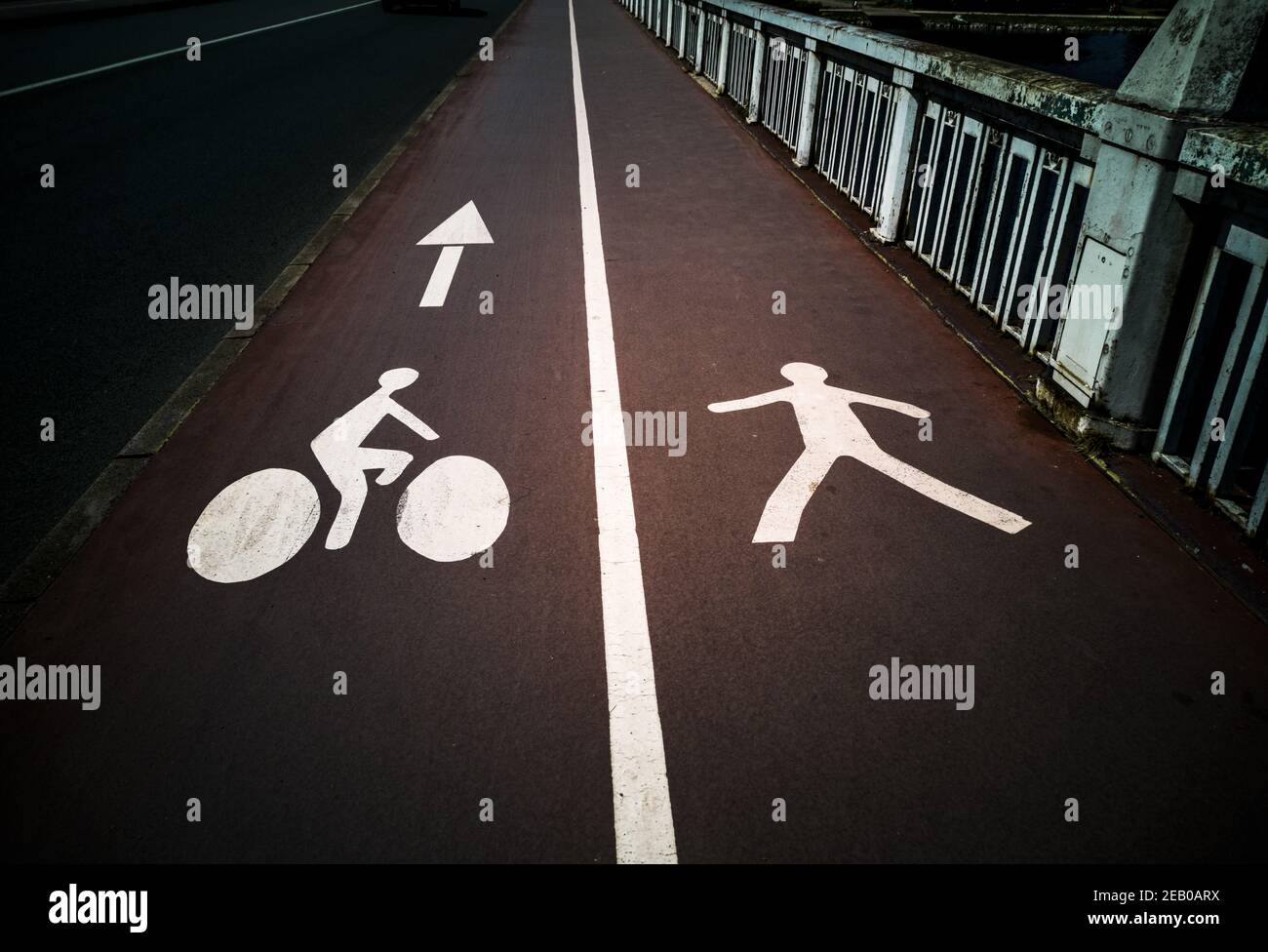 Bicycle lane and pedestrian walkway painted on the ground Stock Photo ...