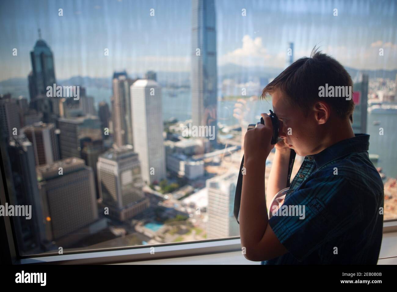 Child viewing HK skyline from Bank of China Tower Stock Photo - Alamy