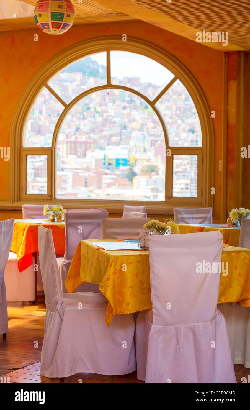 Restaurant interior indoor in yellow colors Stock Photo - Alamy