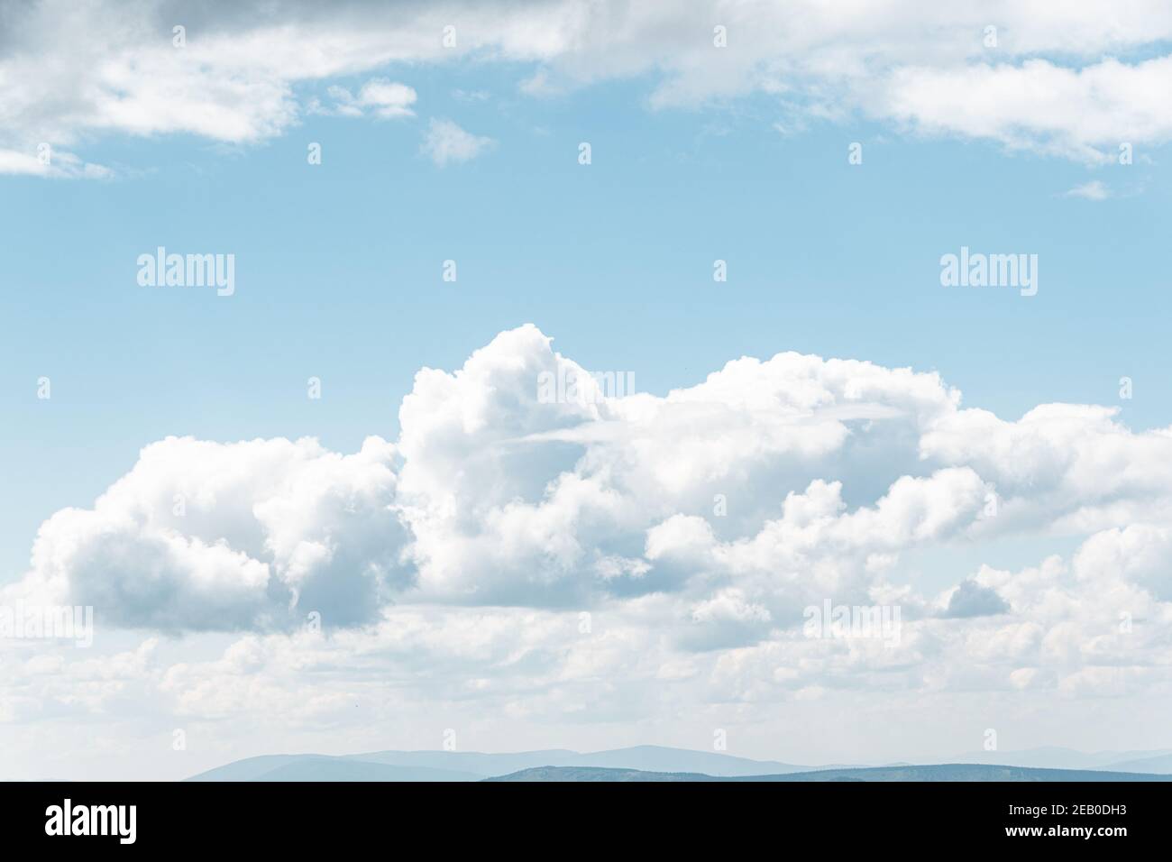 Soft cloud texture on blue sky background Stock Photo - Alamy