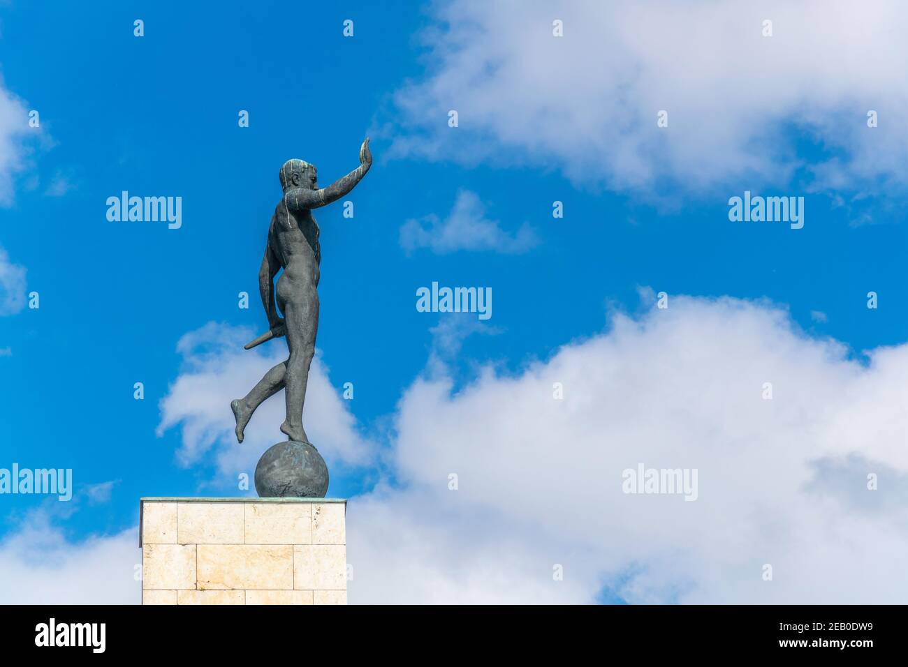HANNOVER, GERMANY, APRIL 28, 2018: Statue of a runner with olympic ...